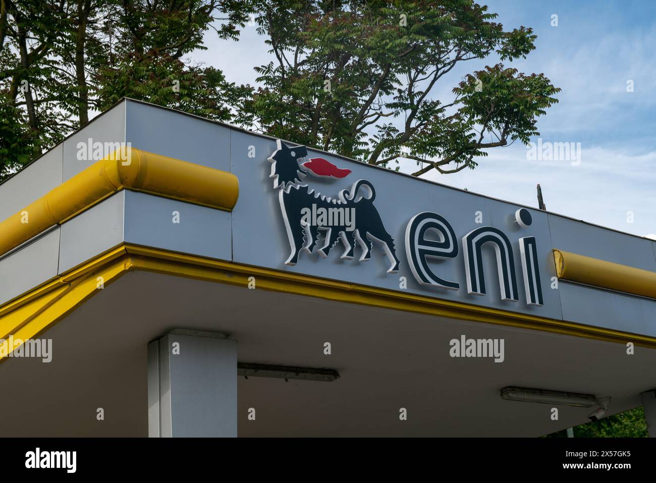 Eni petrol station, symbol of the six legged dog. logo of the energy ...