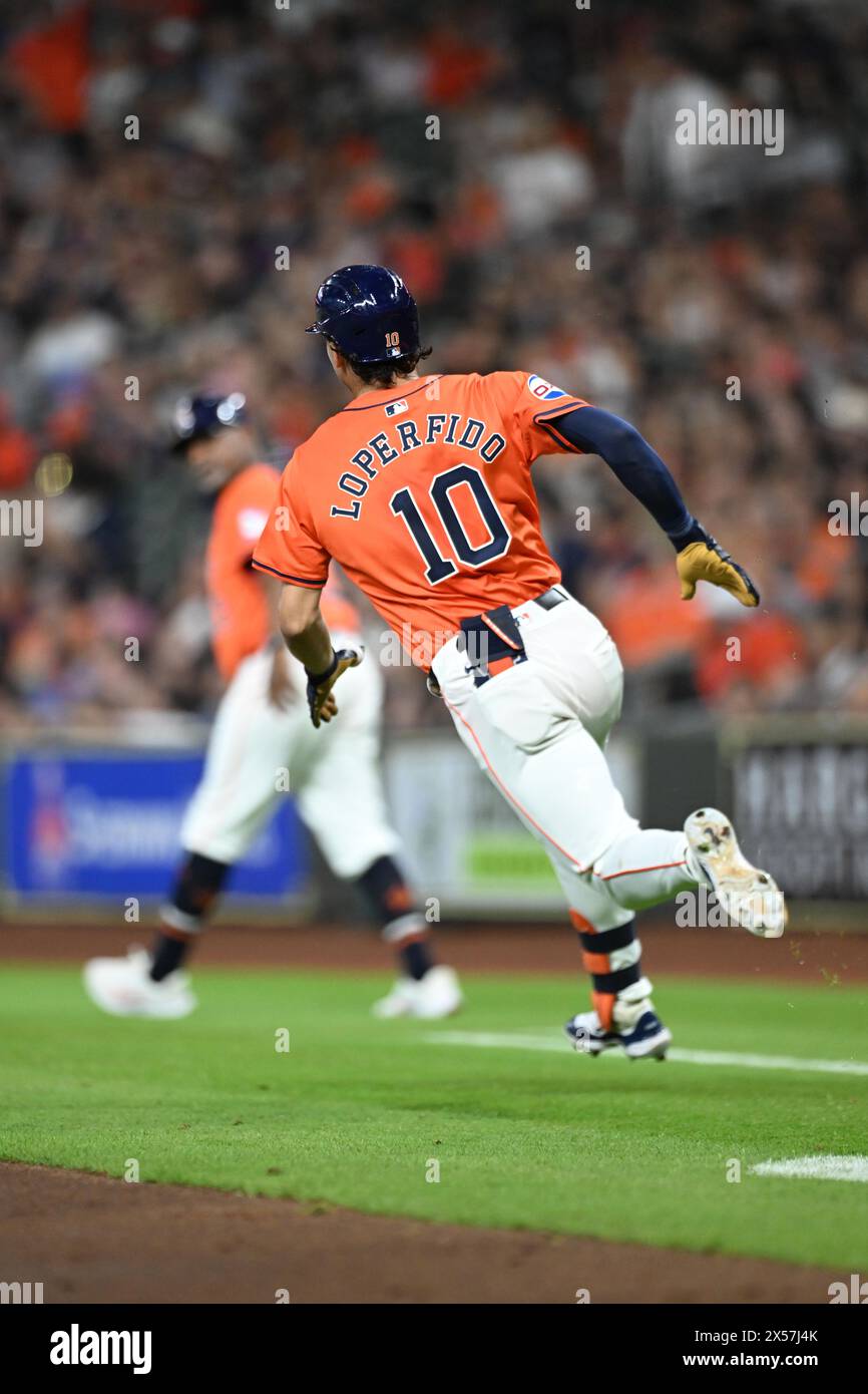Houston Astros outfielder Joey Loperfido (10) singles to right in the ...