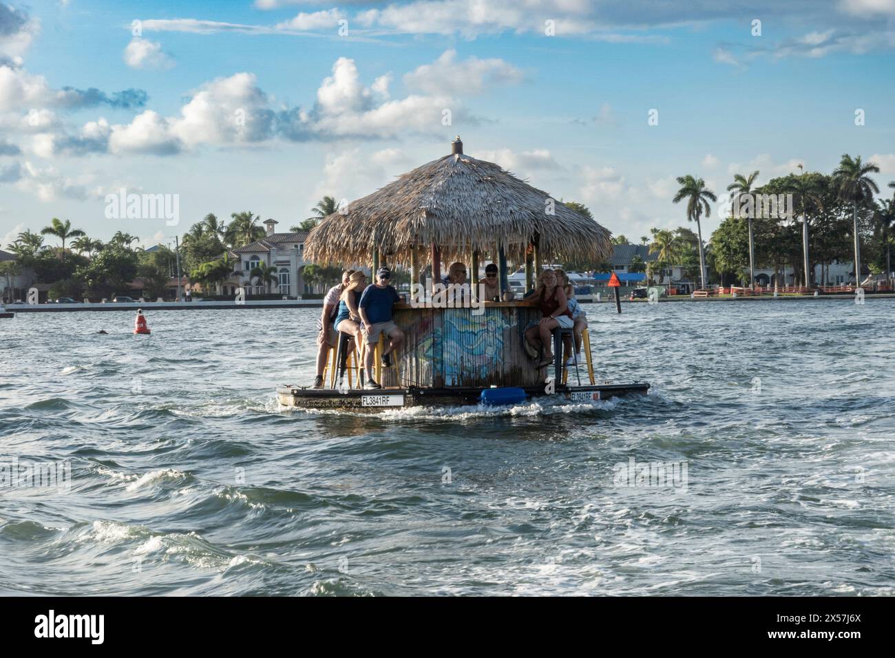 People navigating on a tiki bar boat, Fort Lauderdale, Florida, USA ...