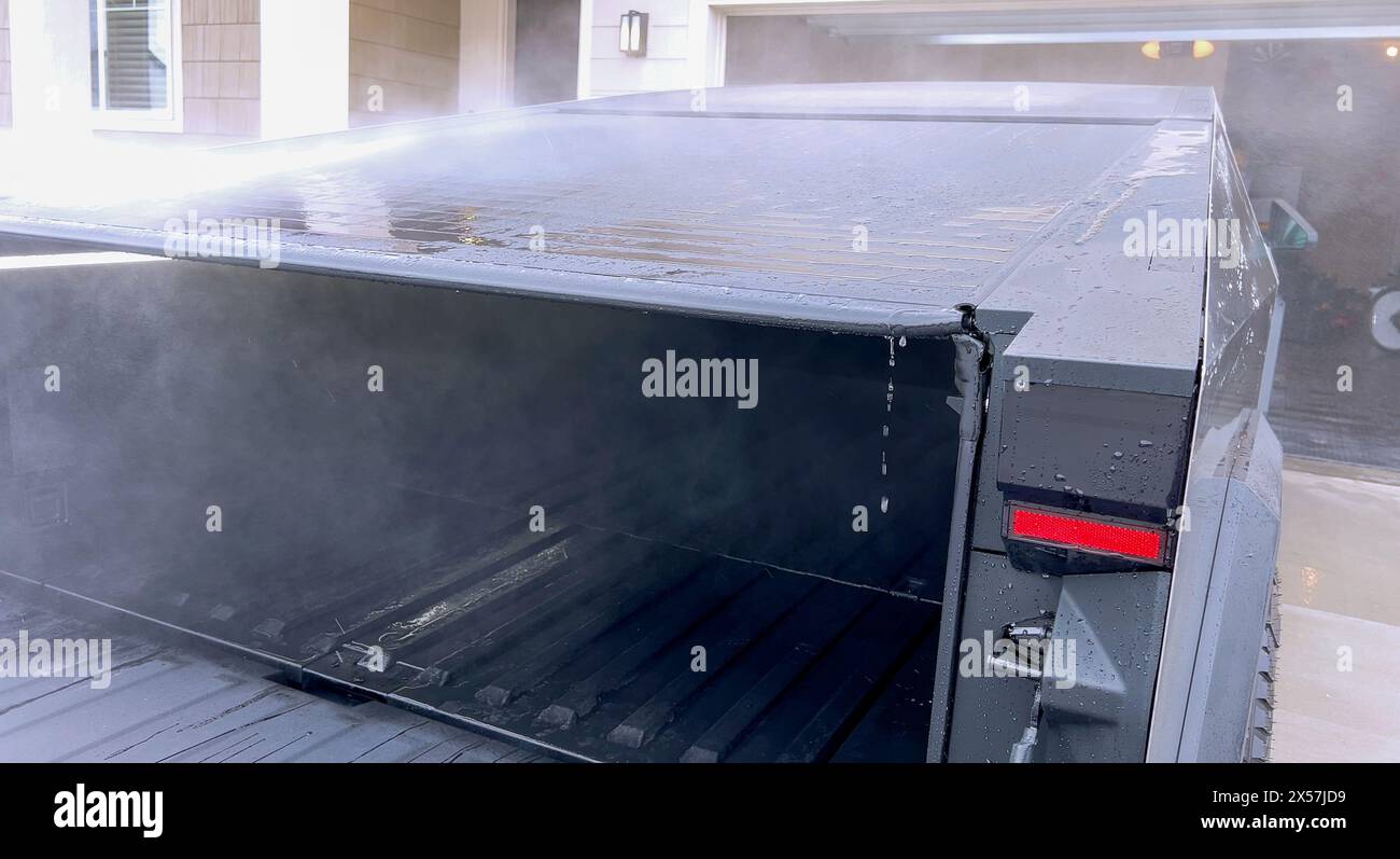 High-Pressure Cleaning of the Tesla Cybertruck Cargo Bed Stock Photo ...