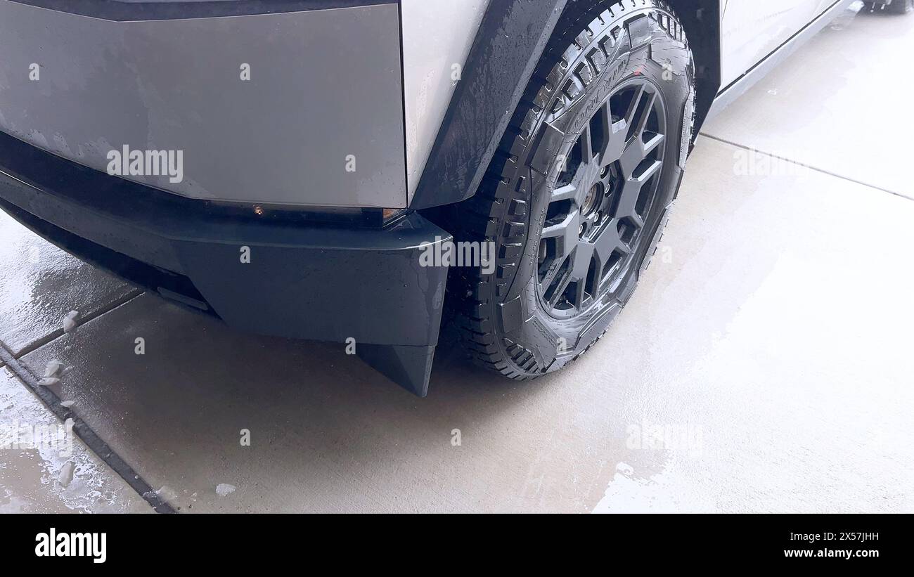 High-Pressure Cleaning of the Tesla Cybertruck Cargo Bed Stock Photo ...