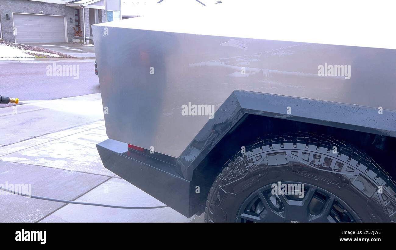 High-Pressure Cleaning of the Tesla Cybertruck Cargo Bed Stock Photo ...
