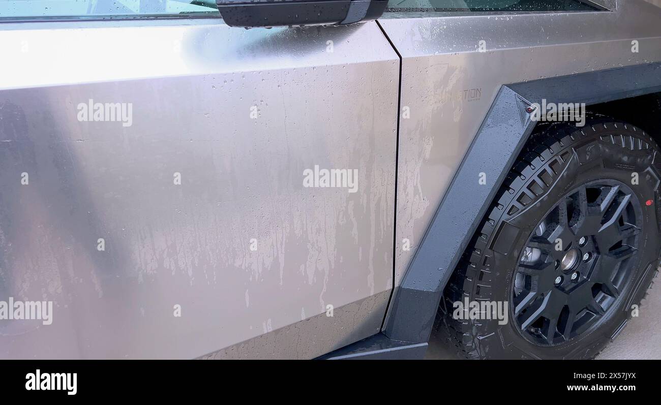 High-Pressure Cleaning of the Tesla Cybertruck Cargo Bed Stock Photo ...
