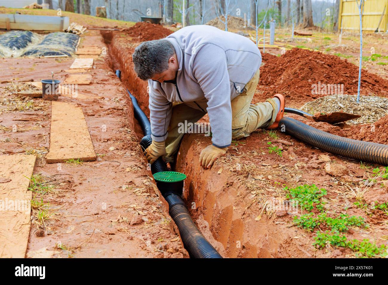 Storm drainage drain pipe installing into trench drain with for ...