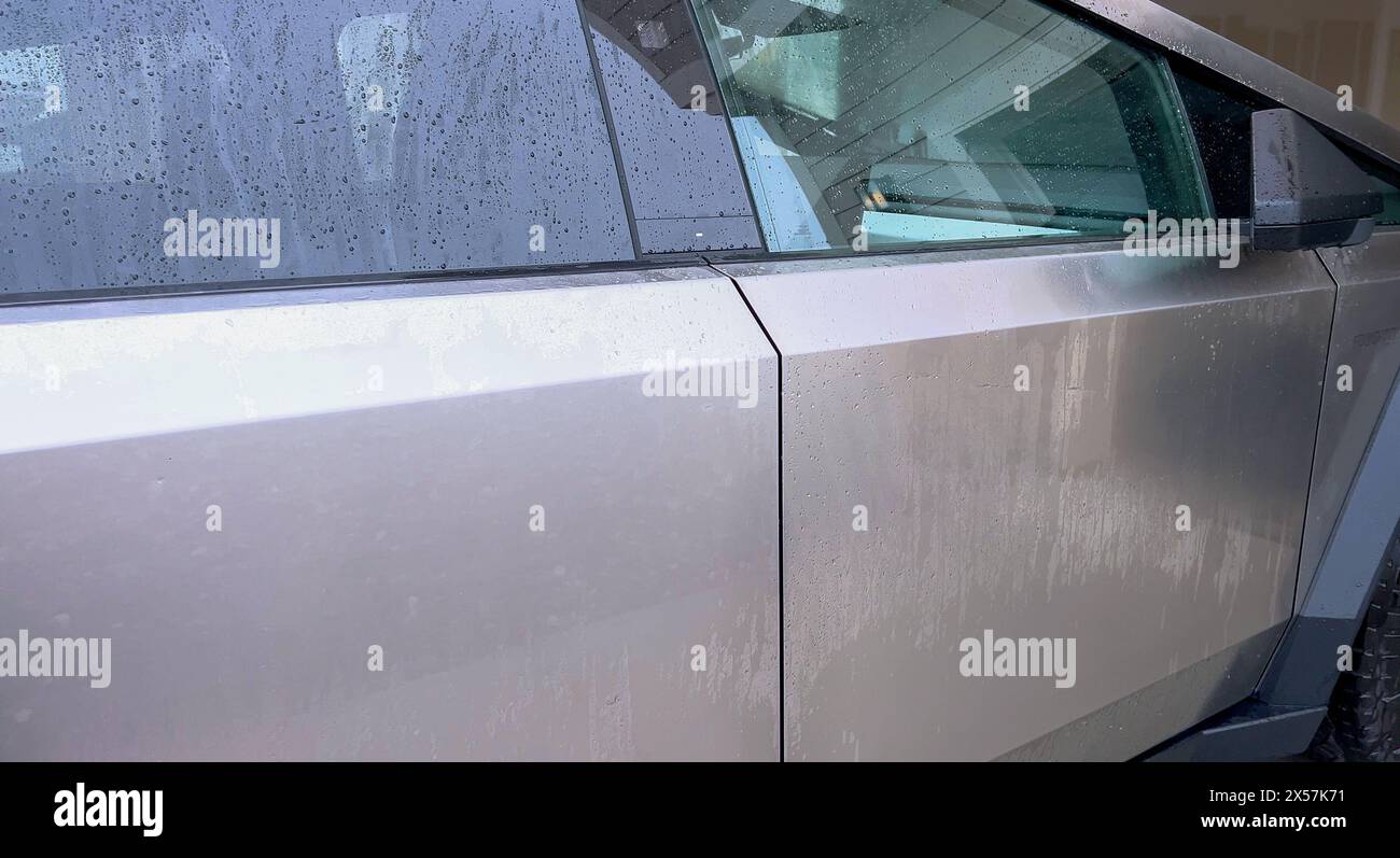 High-Pressure Cleaning of the Tesla Cybertruck Cargo Bed Stock Photo ...