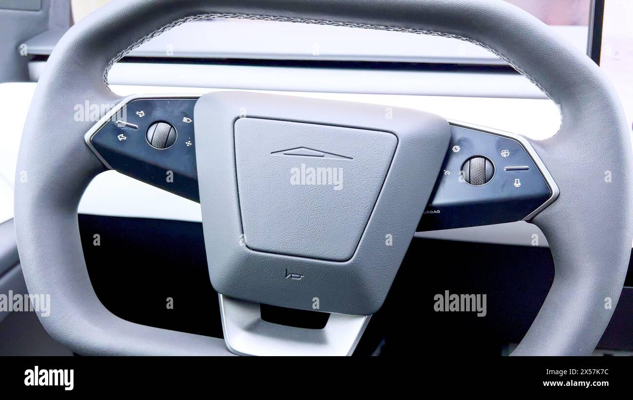 Close-Up View of Tesla Cybertruck Futuristic Steering Wheel Stock Photo ...