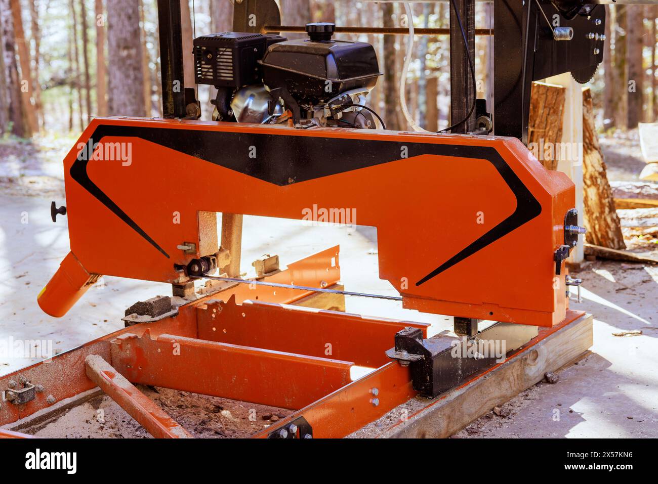 Logs are machined using sawmill equipment, which saws tree trunks on ...