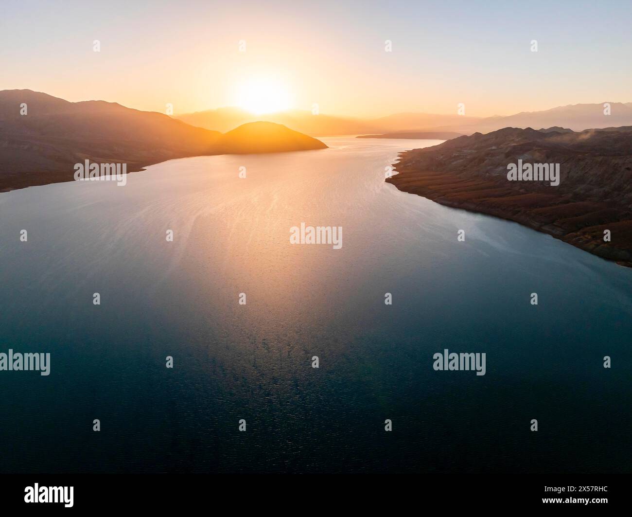 Sunset over the Toktogul reservoir at sunset, aerial view, Kyrgyzstan ...