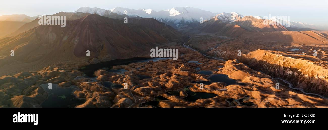 PanoramaWhite glaciated and snow-covered mountain peak Pik Lenin at ...
