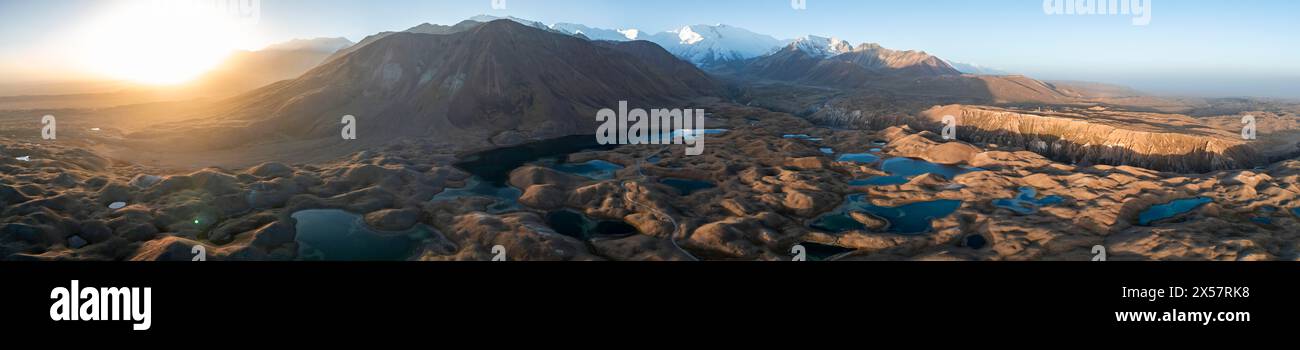 Panorama, White glaciated and snow-covered mountain peak Pik Lenin at ...
