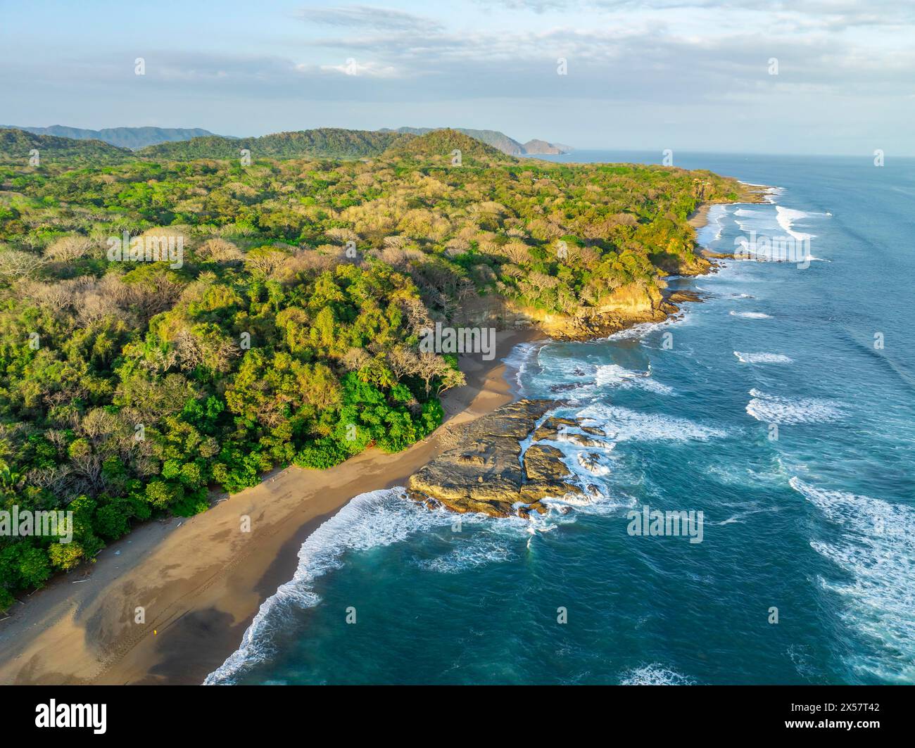 Aerial view, rainforest, sandy beach and coast with waves, Playa ...
