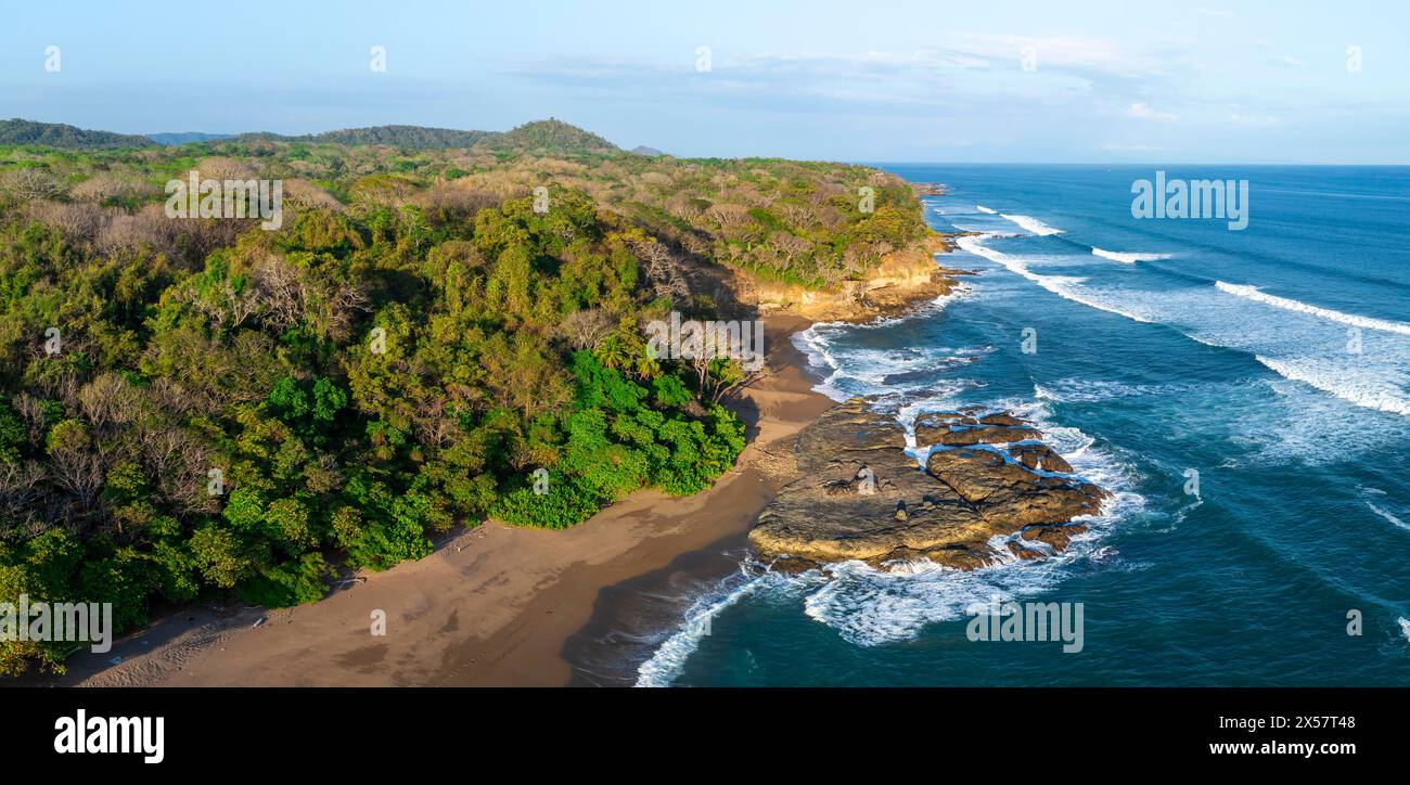 Aerial view, rainforest, sandy beach and coast with waves, Playa ...