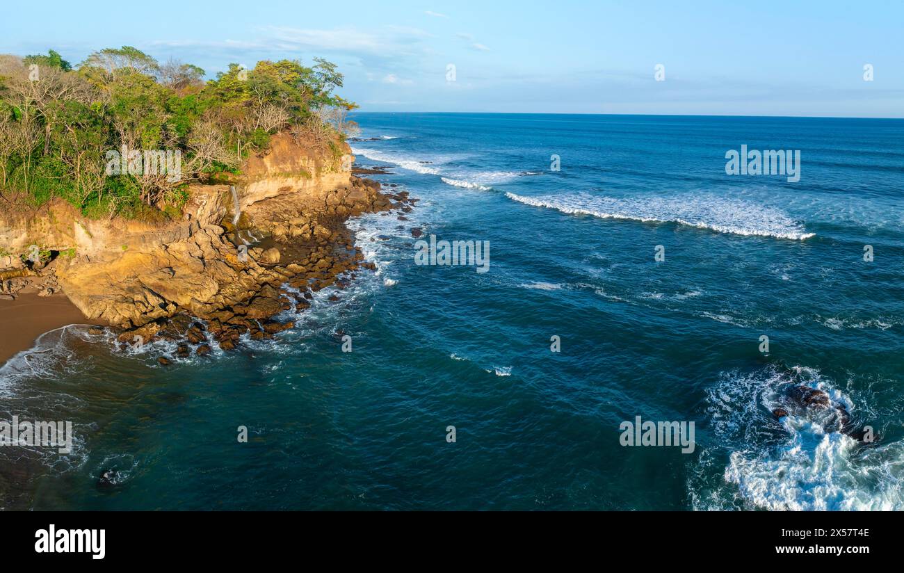 Aerial view, rainforest, sandy beach and coast with waves, Playa ...