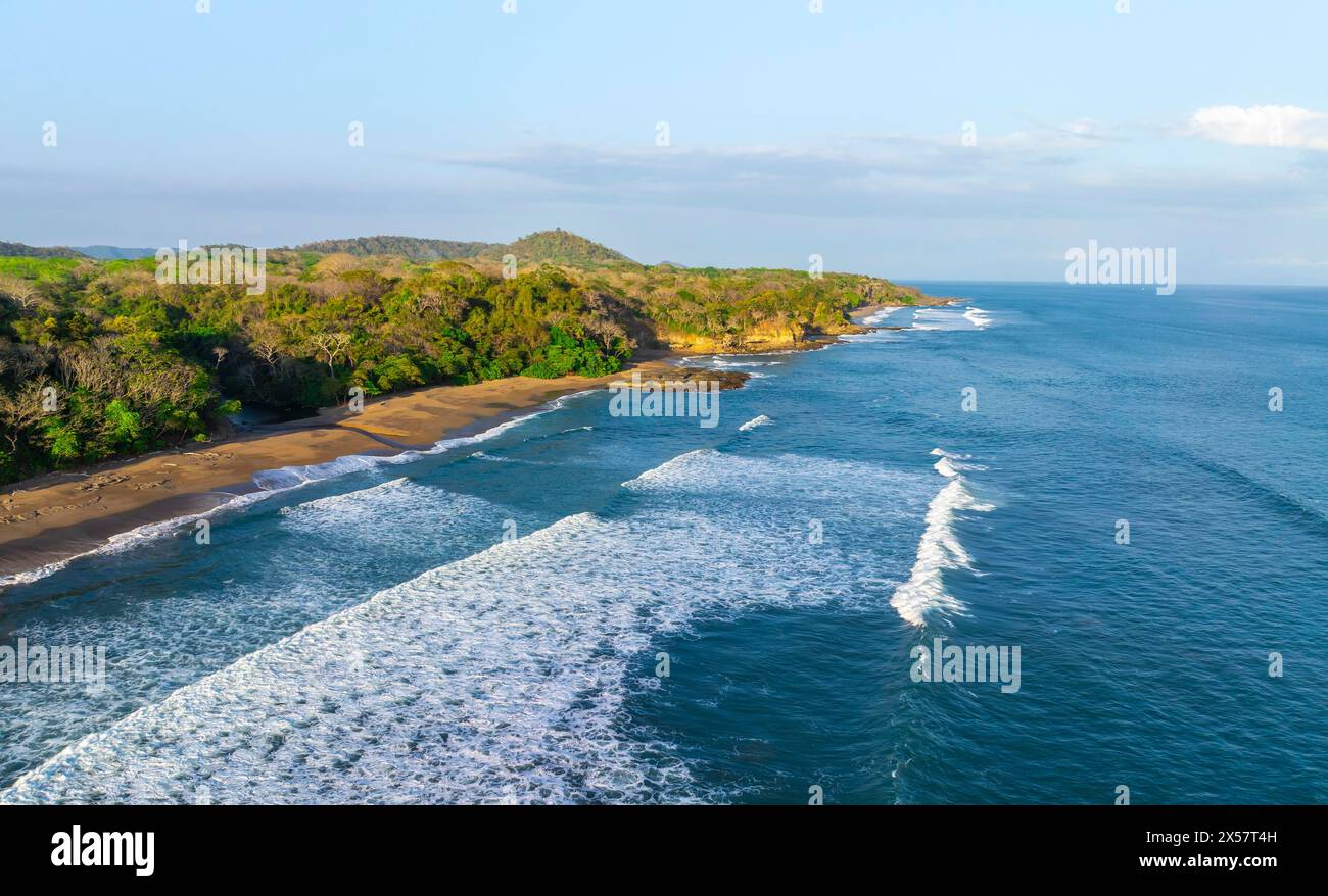 Aerial view, rainforest, sandy beach and coast with waves, Playa ...