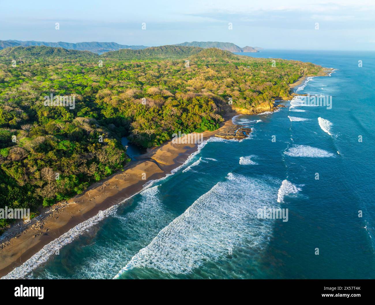 Aerial view, rainforest, sandy beach and coast with waves, Playa ...