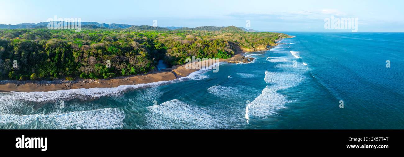 Aerial view, rainforest, sandy beach and coast with waves, Playa ...