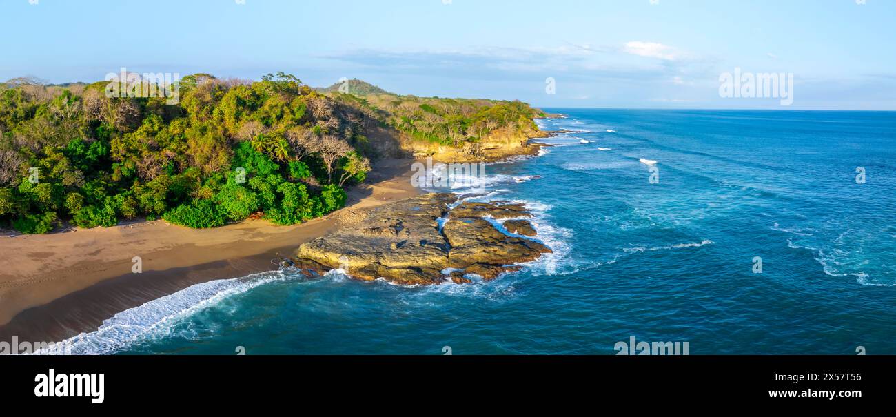 Aerial view, rainforest, sandy beach and coast with waves, Playa ...