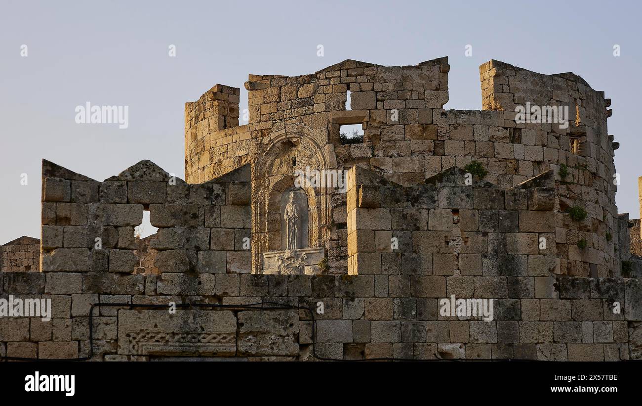 Dilapidated historical ruin under the warm light of the rising sun, Tor ...
