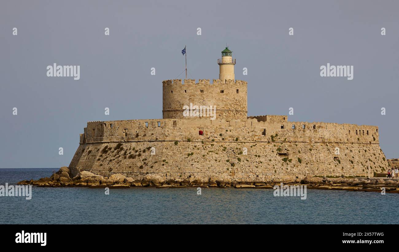 View of a solitary stone fortress with lighthouse by the sea, Fort of ...