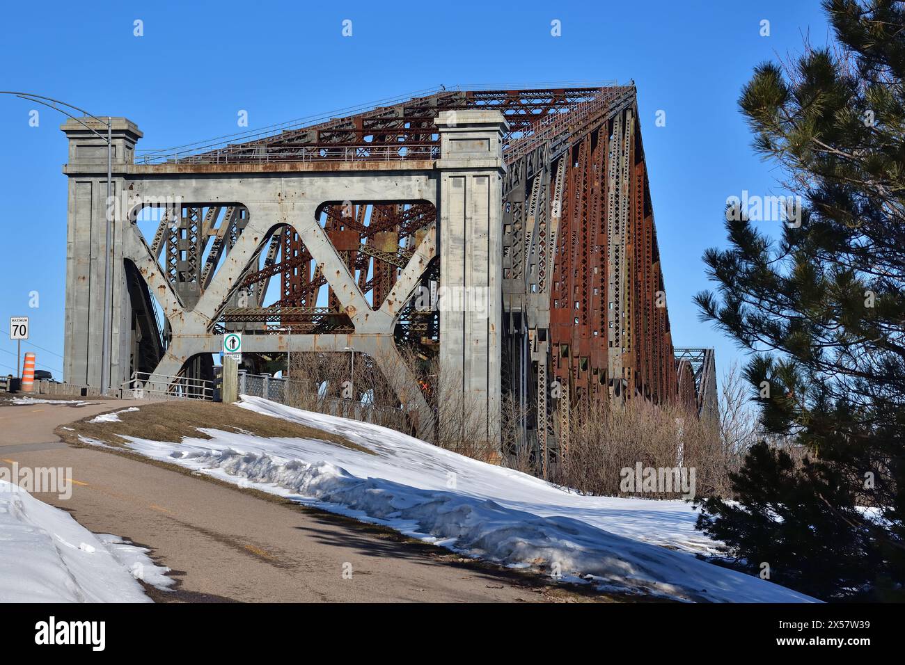 The Quebec Bridge is a riveted steel truss structure. Between Levis and ...