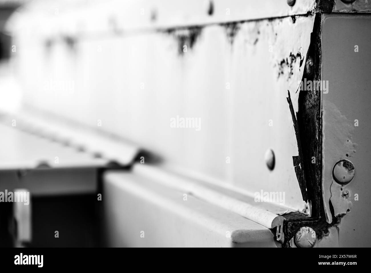 Rusted and peeling paint on an electrical transformer exposed to the ...