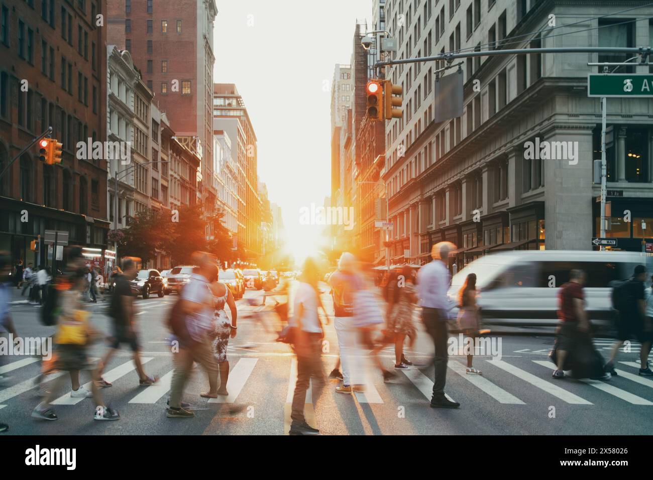 Busy intersection is crowded with people and traffic on 23rd Street in ...