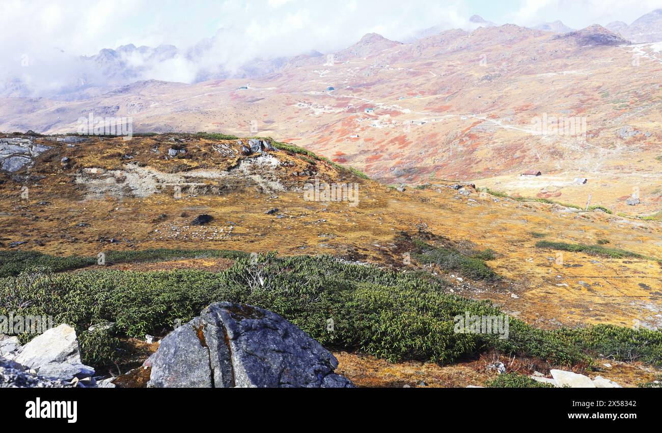 cloudy alpine landscape of nathang valley, high himalaya region of east ...