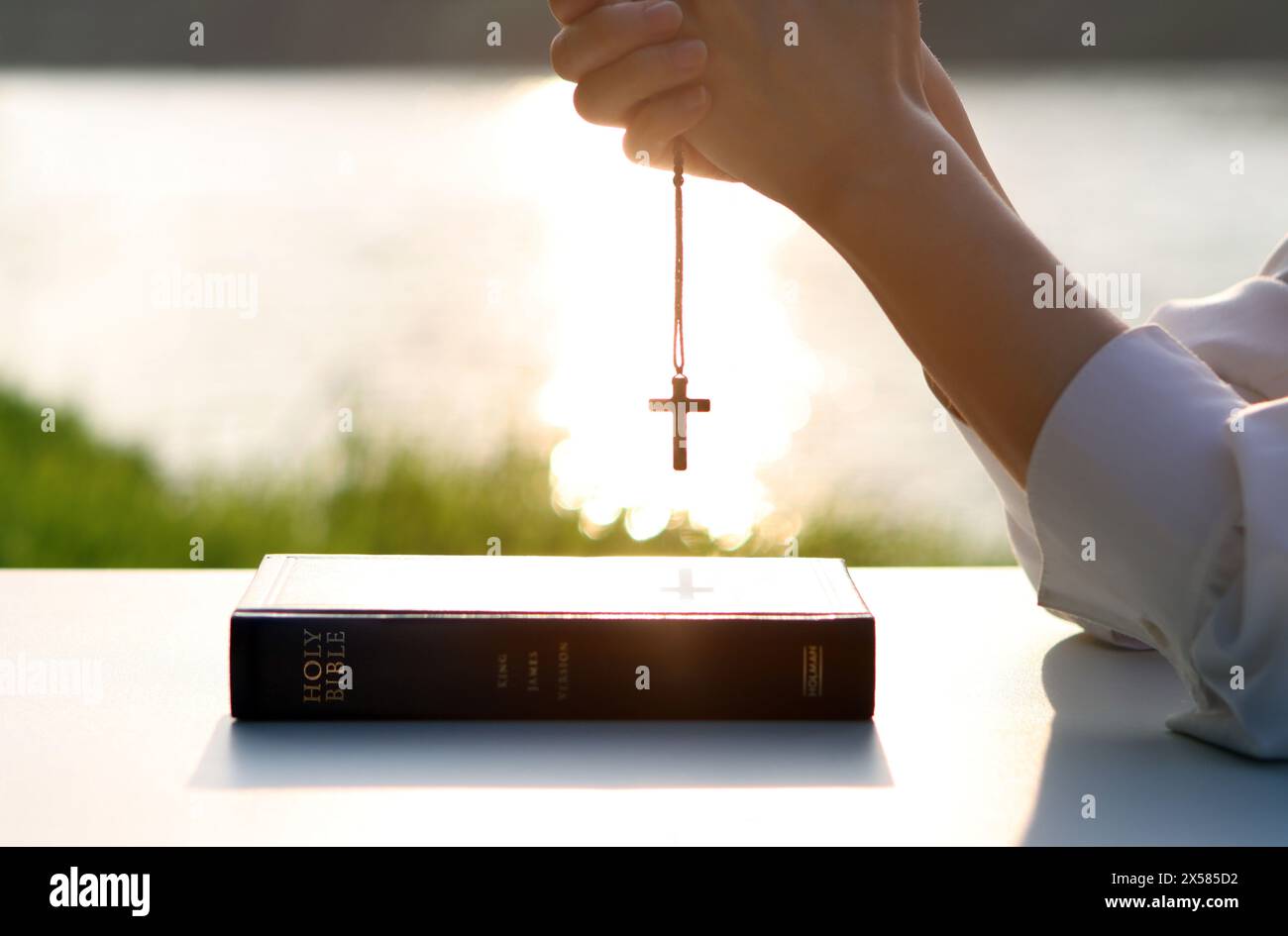 Christian praying, meditating and worshiping with hands together ...