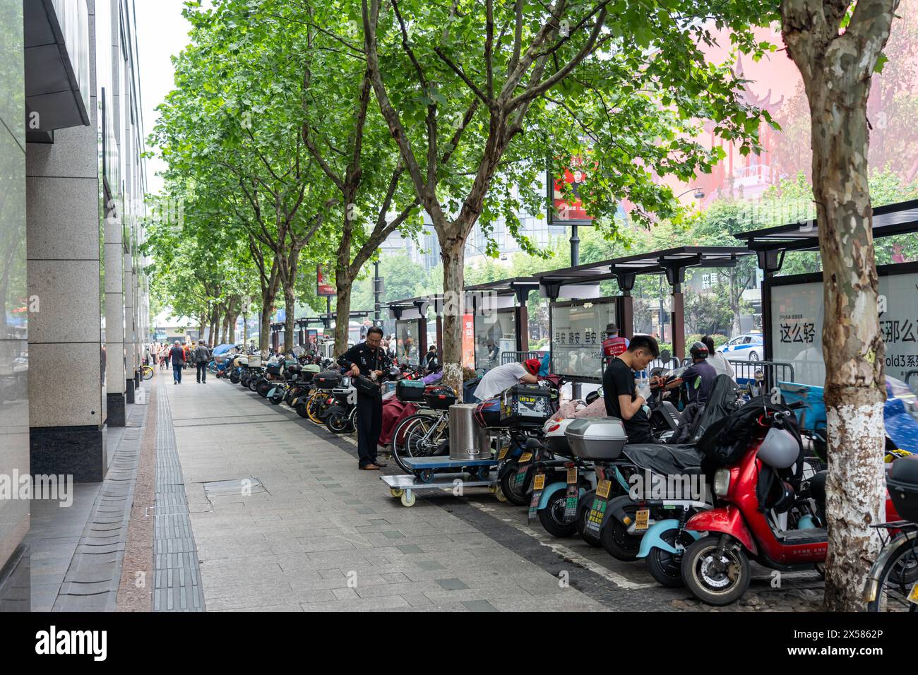 May 07, 2024, Hangzhou, China: Peopel walking around at Hubin Road. This is a famous tourist and ...