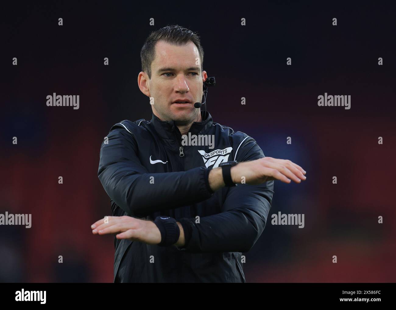 London, UK. 6th May, 2024. Referee Jarred Gillett warms up wearing a ...