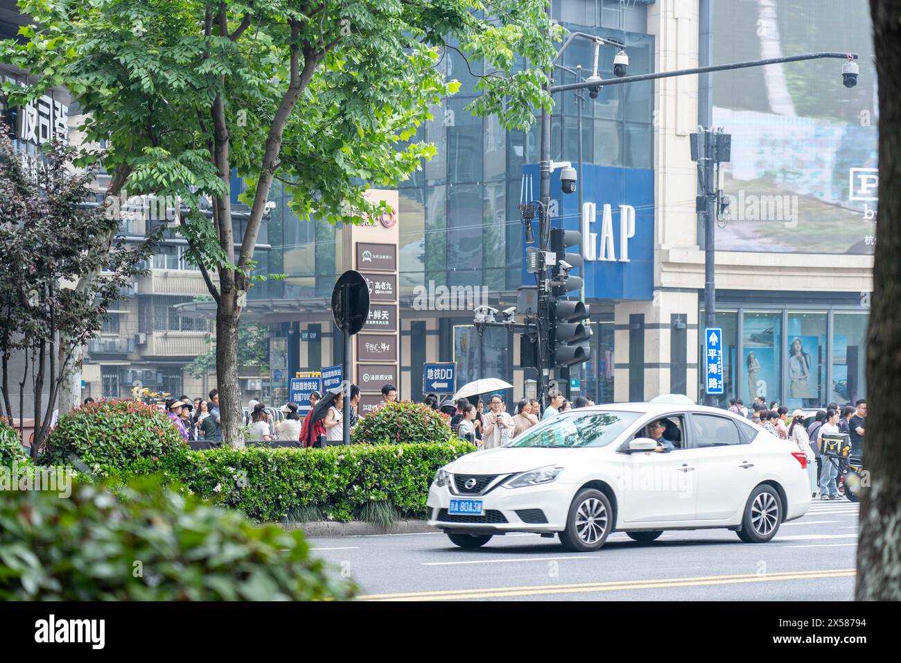 May 07, 2024, Hangzhou, China: Peopel walking around at Hubin Road ...