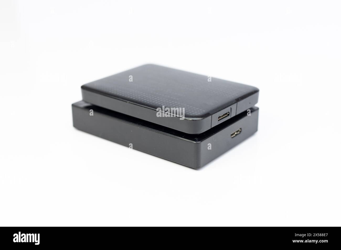 Two external hard drives for backup isolated on white background Stock ...