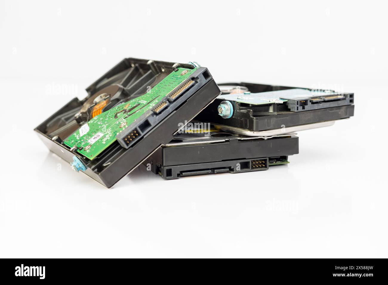 A heap of 3.5 inch internal hard disk drives for storage data isolated ...