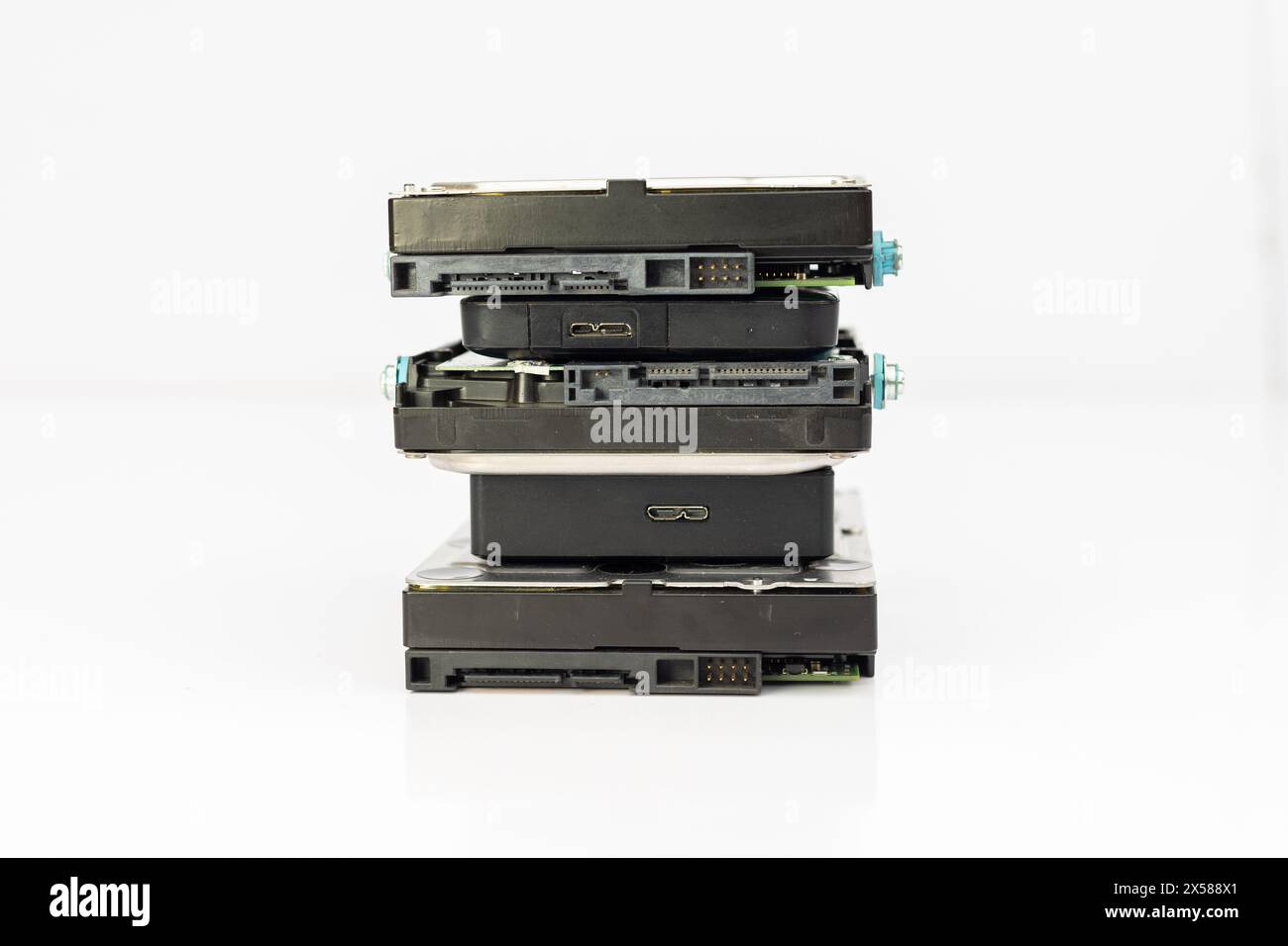 Hard disc drives stacked isolated on white background with copy space ...