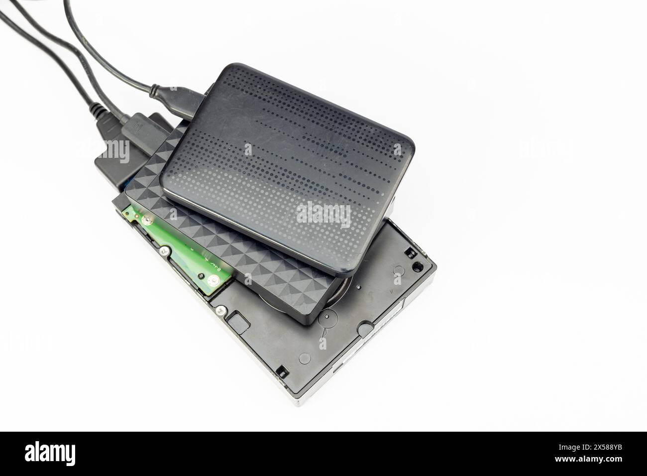 External hard disc drives connected to transfer files isolated on white ...