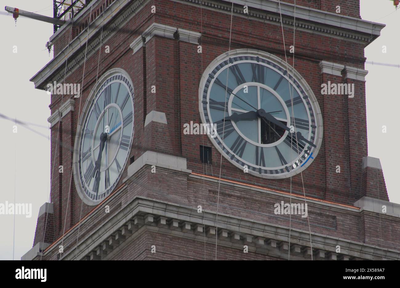 The historic clock tower at the Seattle train station during repairs ...