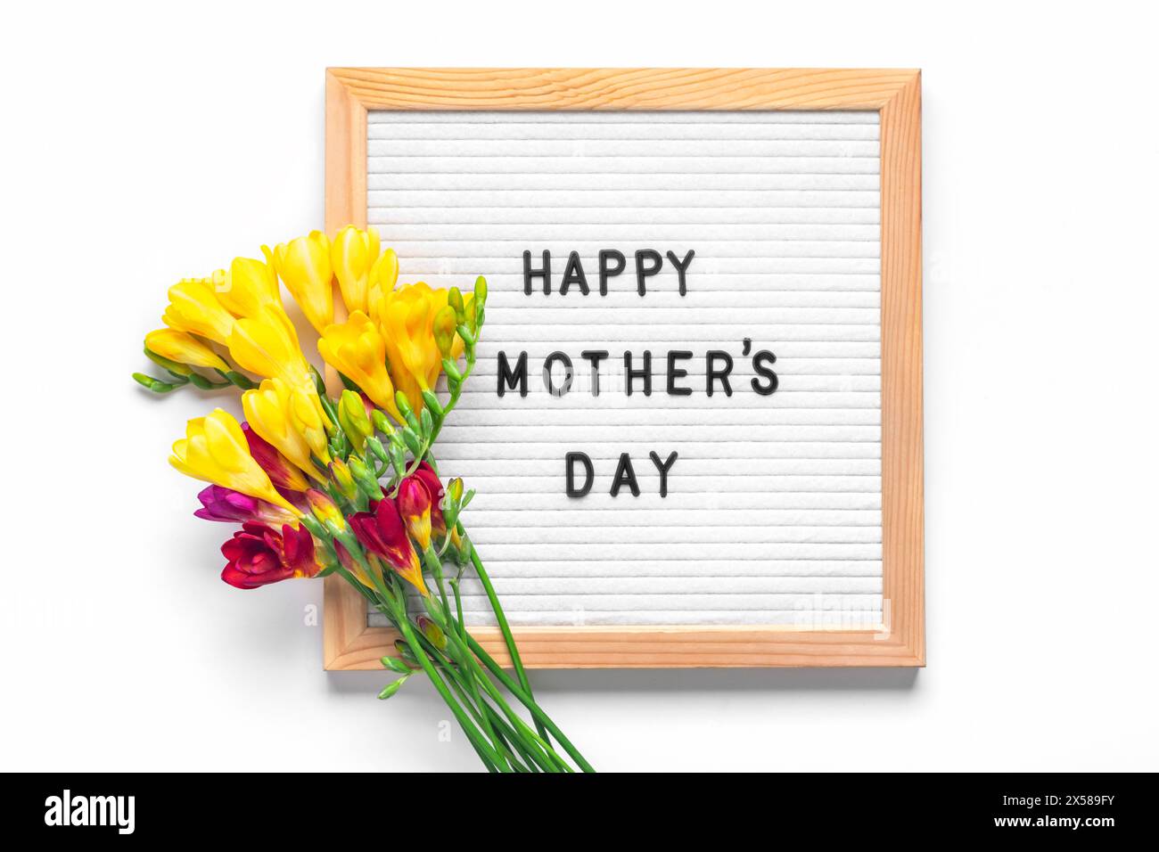 Felt board with text Happy Mother's day, Bouquet of sprig freesia ...