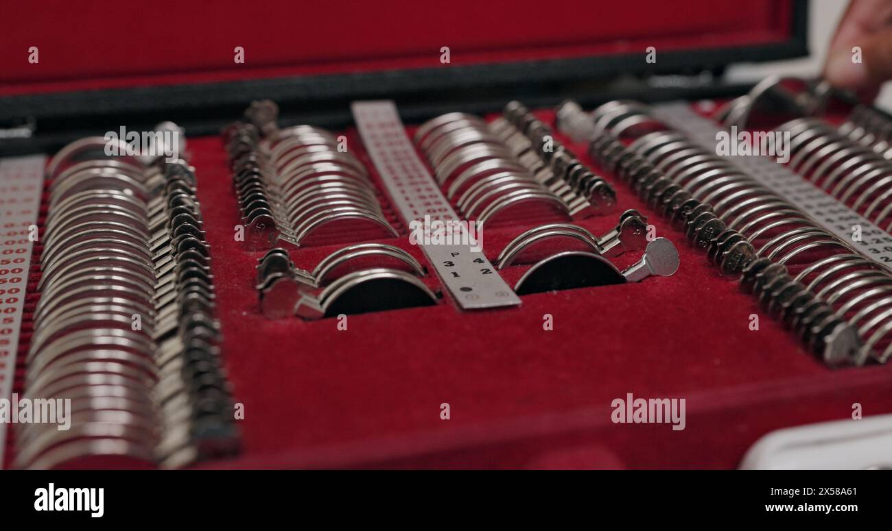 Closeup, optometry and frame in box, tools and equipment for exam, test ...