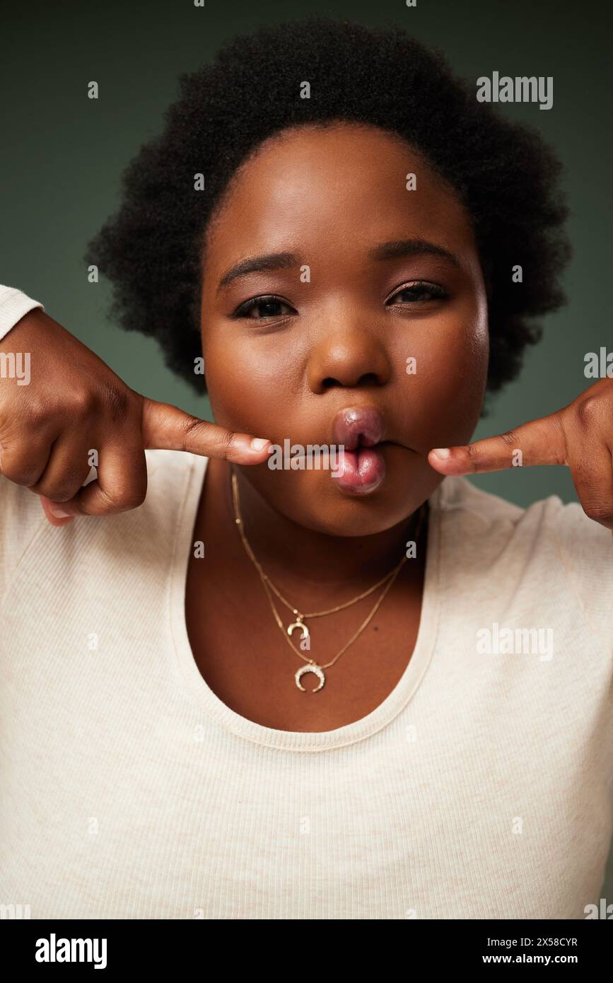 Comic, black woman and funny fish face in studio for comedy or joke ...