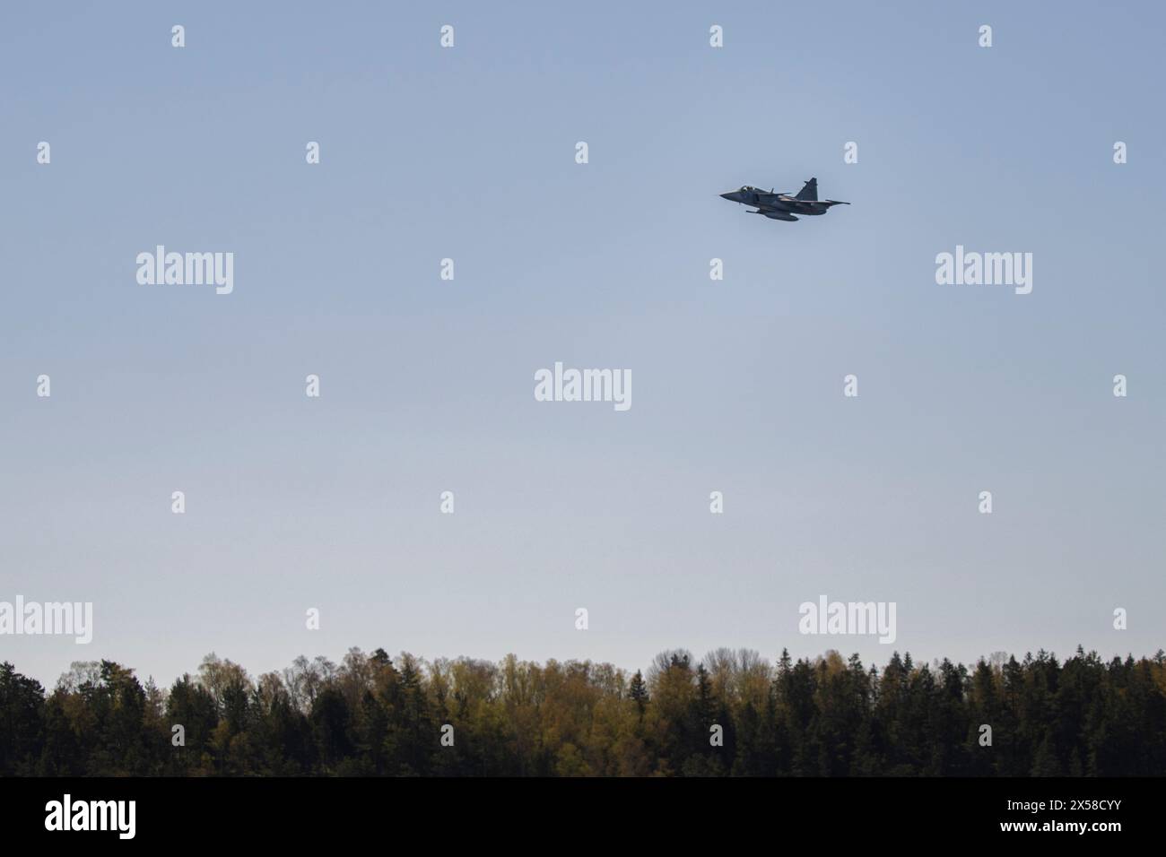 Swedish fighter jets fly over the corvette Helsingborg during a visit ...