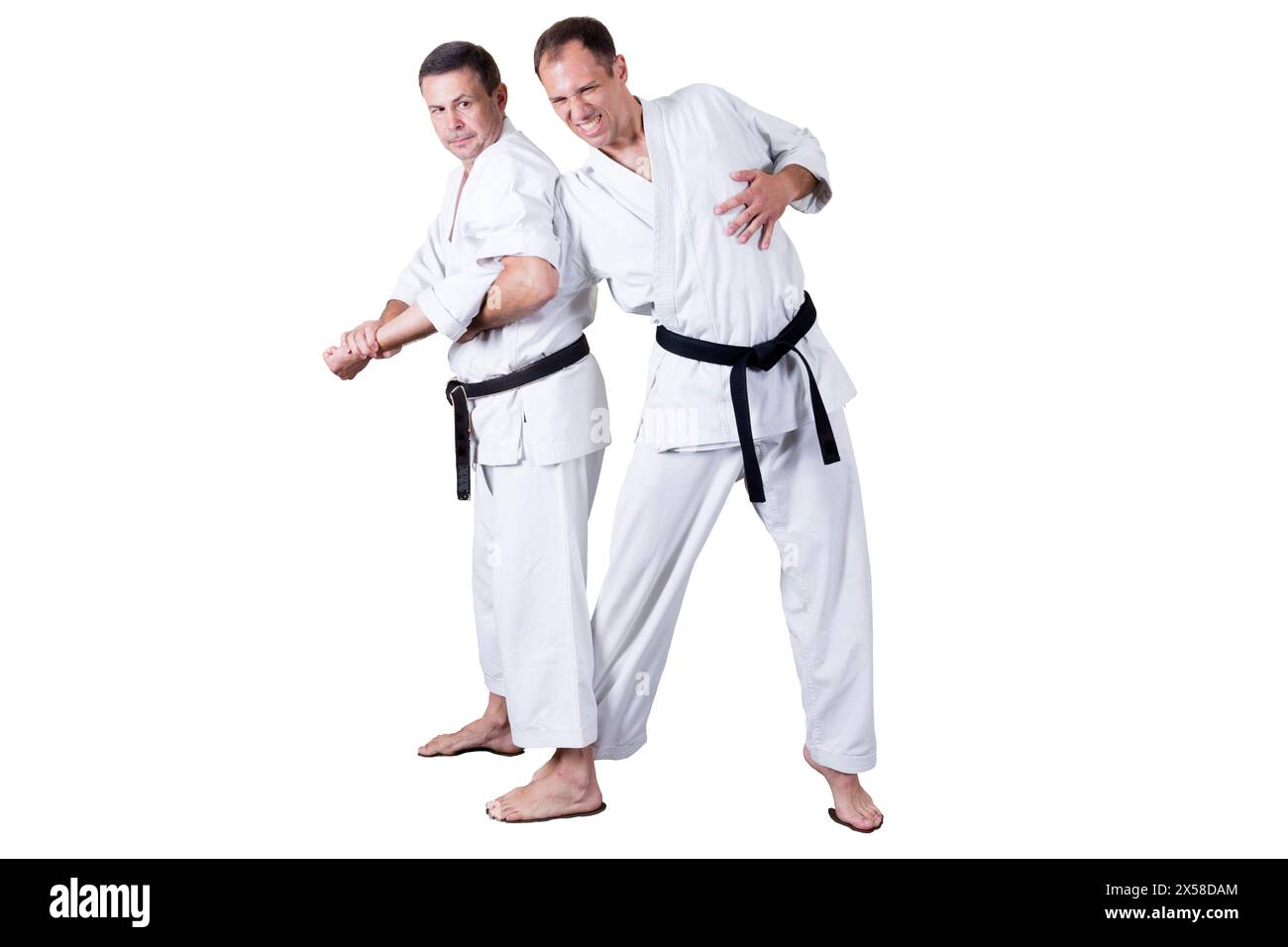 Adult athlete performs formal goju-ryu exercises. It is isolated in a ...