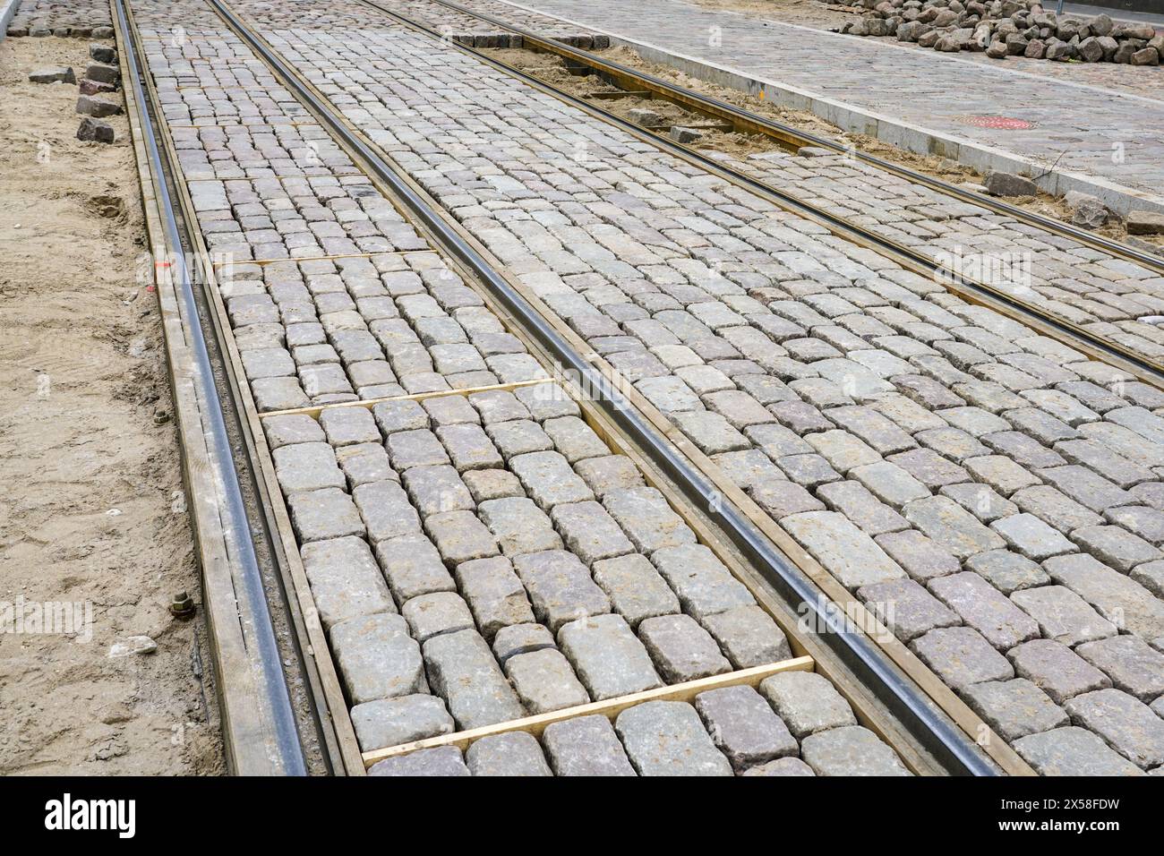 Newly replaced tram tracks and intermediate track surface paved with ...