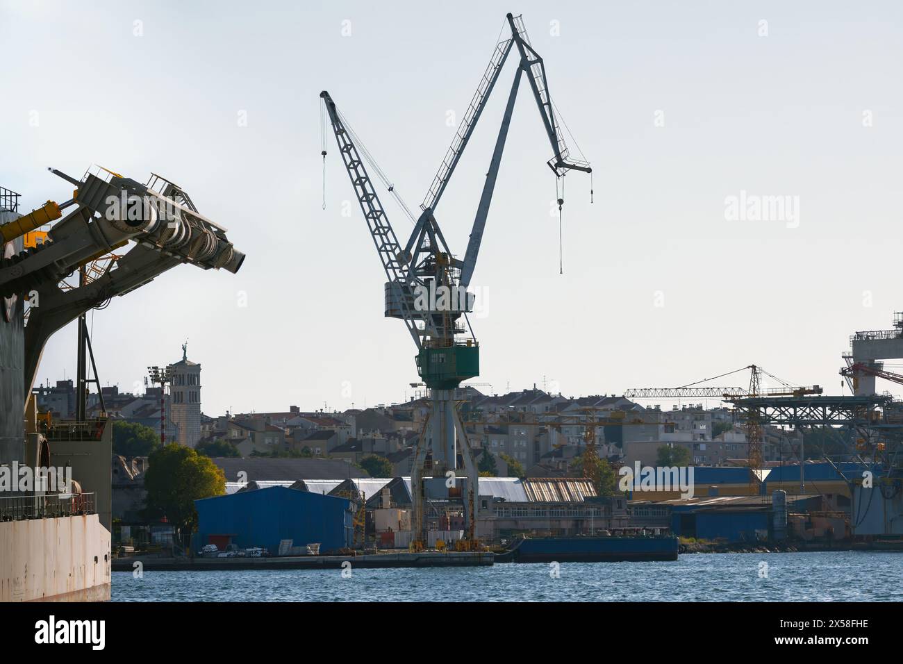 Port of Pula, Croatia, with cranes and ships. Commercial nautical dock ...