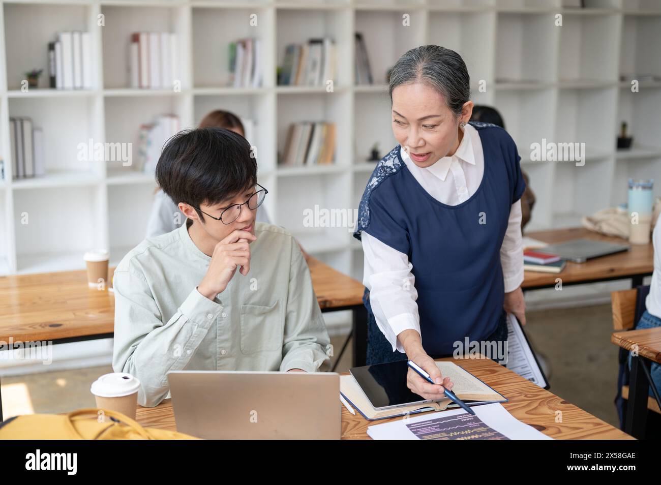 Asian male teacher math class hi-res stock photography and images - Alamy