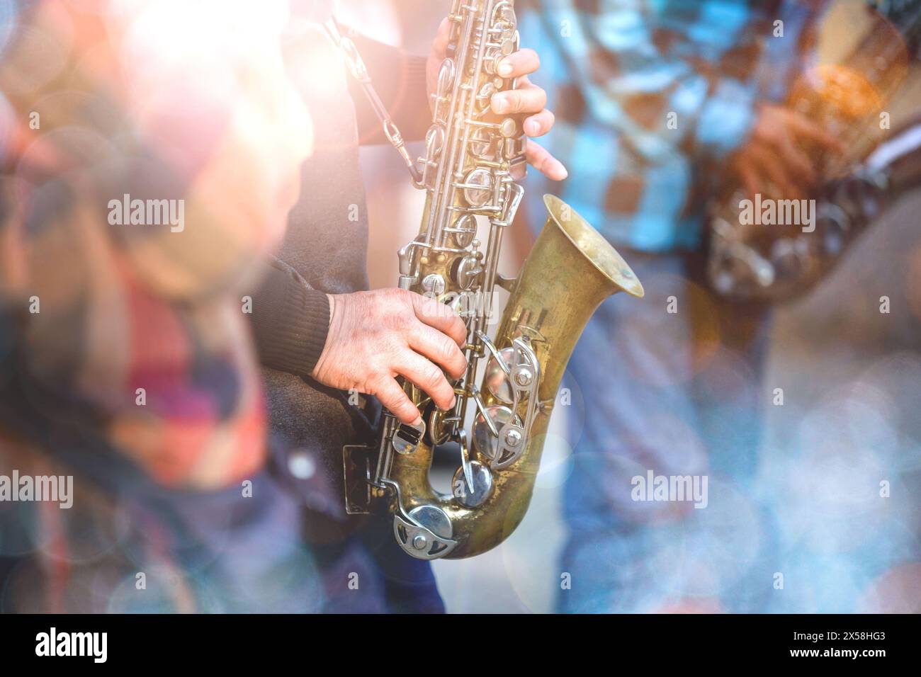 Blue saxophonist hands hi-res stock photography and images - Alamy