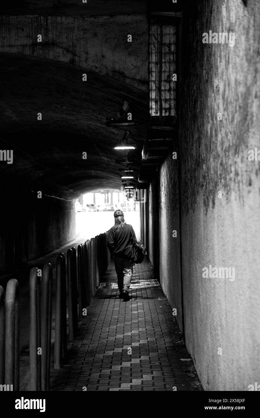 Woman stretching under bridge hi-res stock photography and images - Alamy