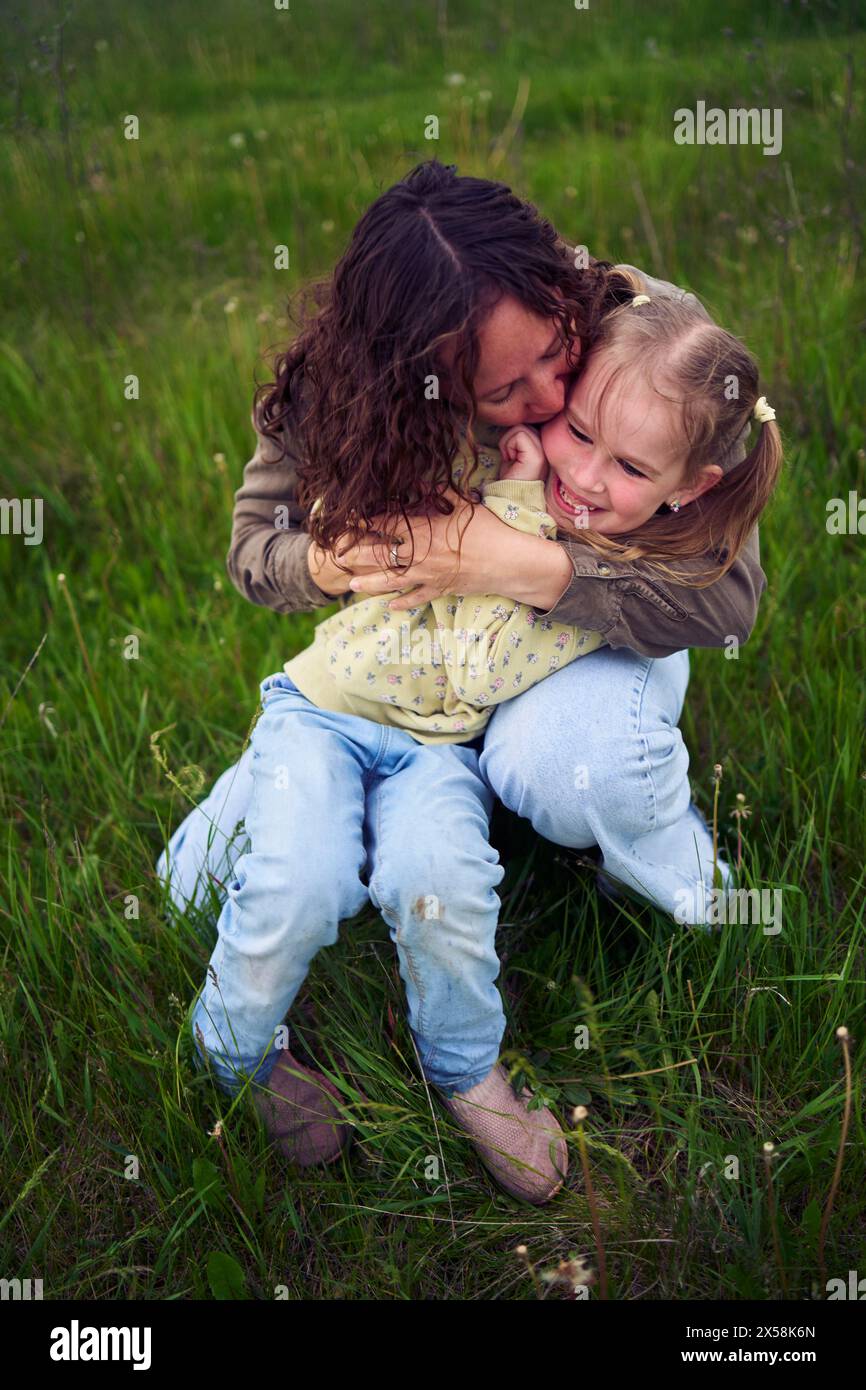 a mother plays catch-up with her daughters Stock Photo - Alamy a mother plays catch-up with her daughters Stock Photo - Alamy