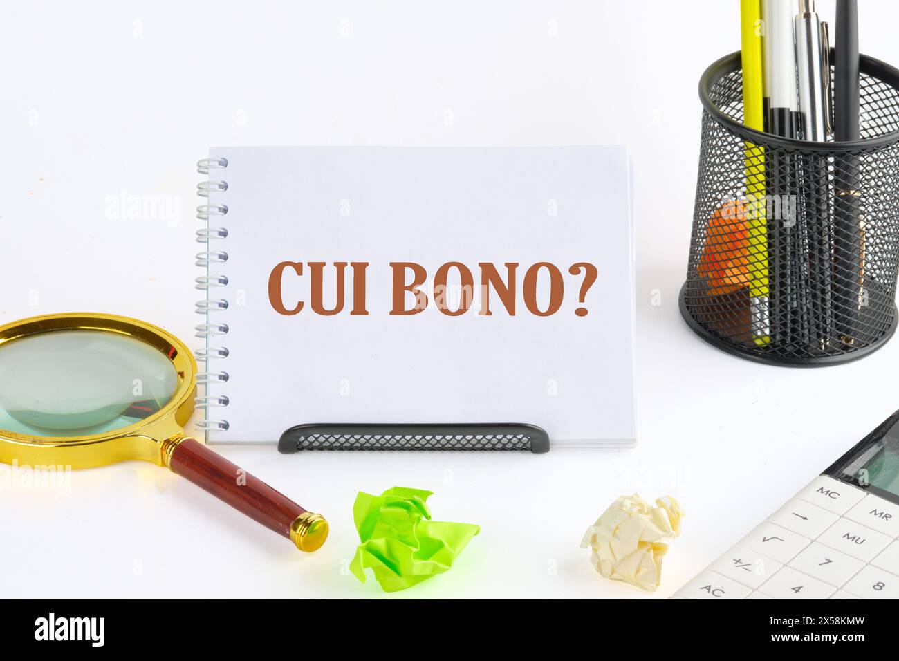 CUI BONO (to whose benefit) question on a notepad standing on a stand ...