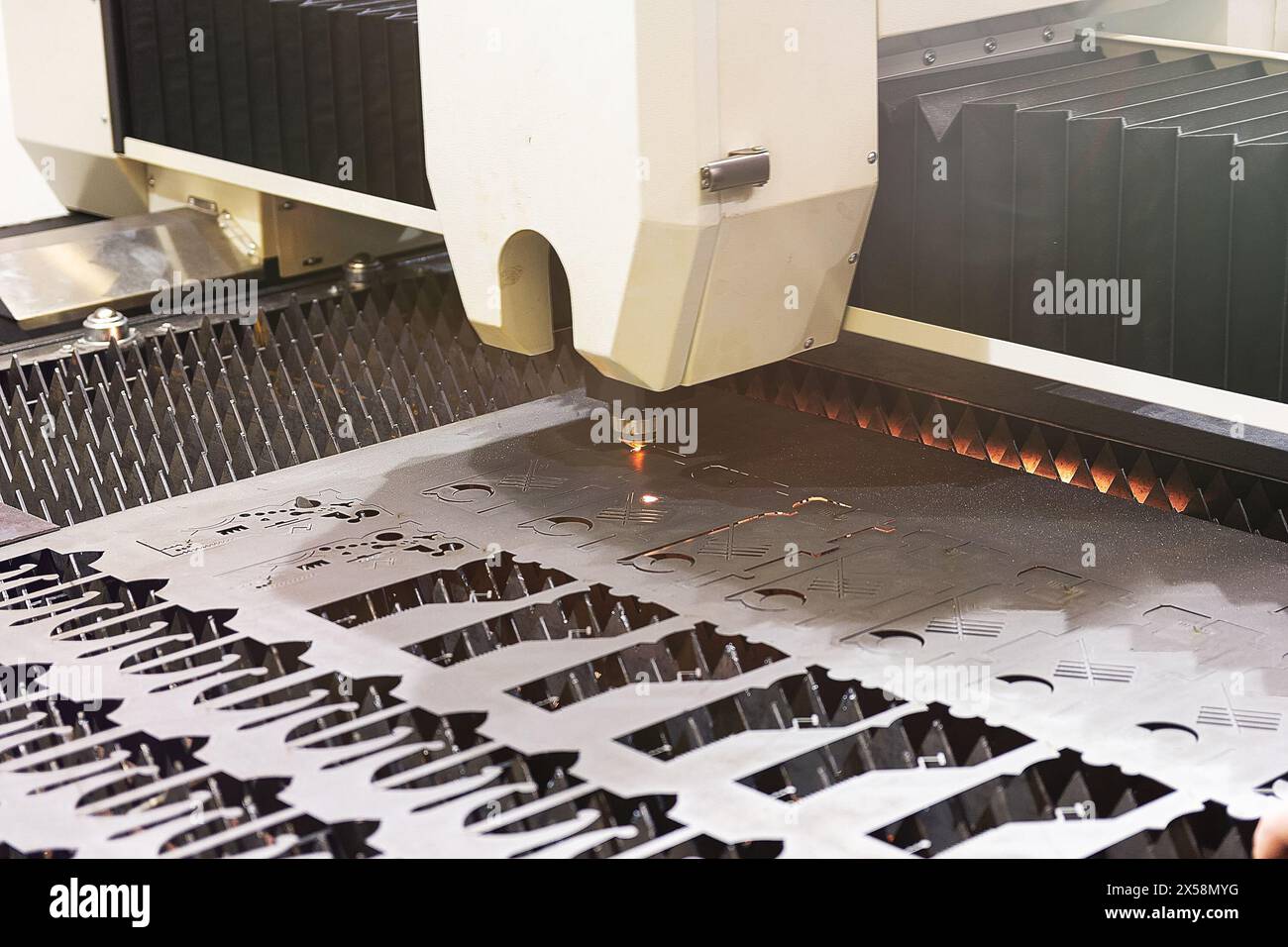 Laser CNC machine cutting of sheet metal. Industry Stock Photo - Alamy
