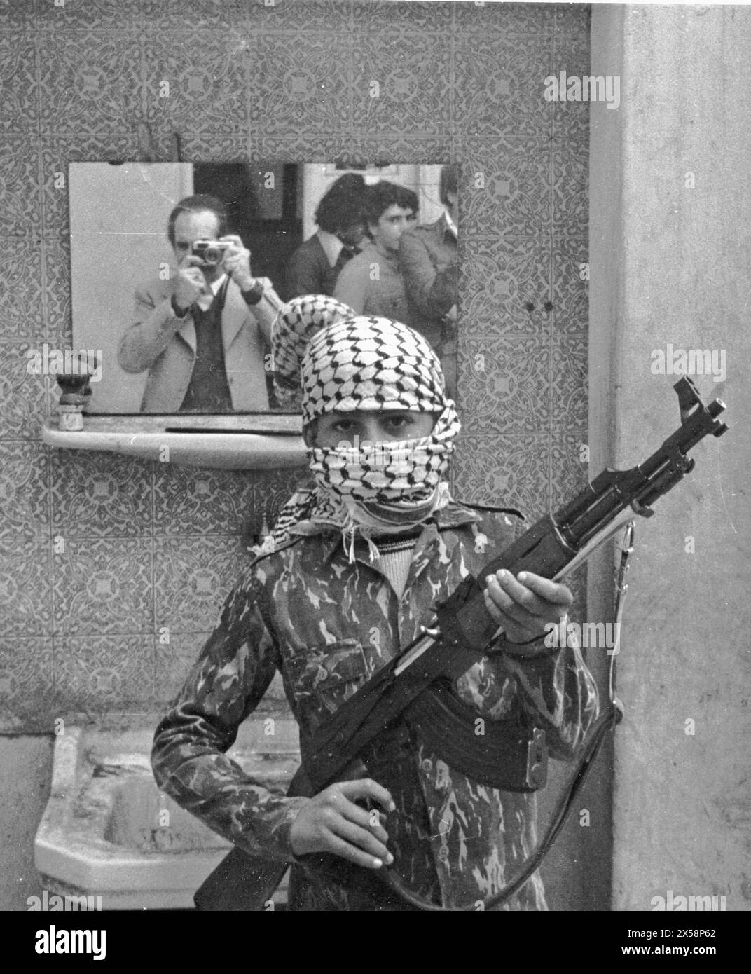 Photograph of Italian Artist Bruno Caruso photographing a guerilla ...